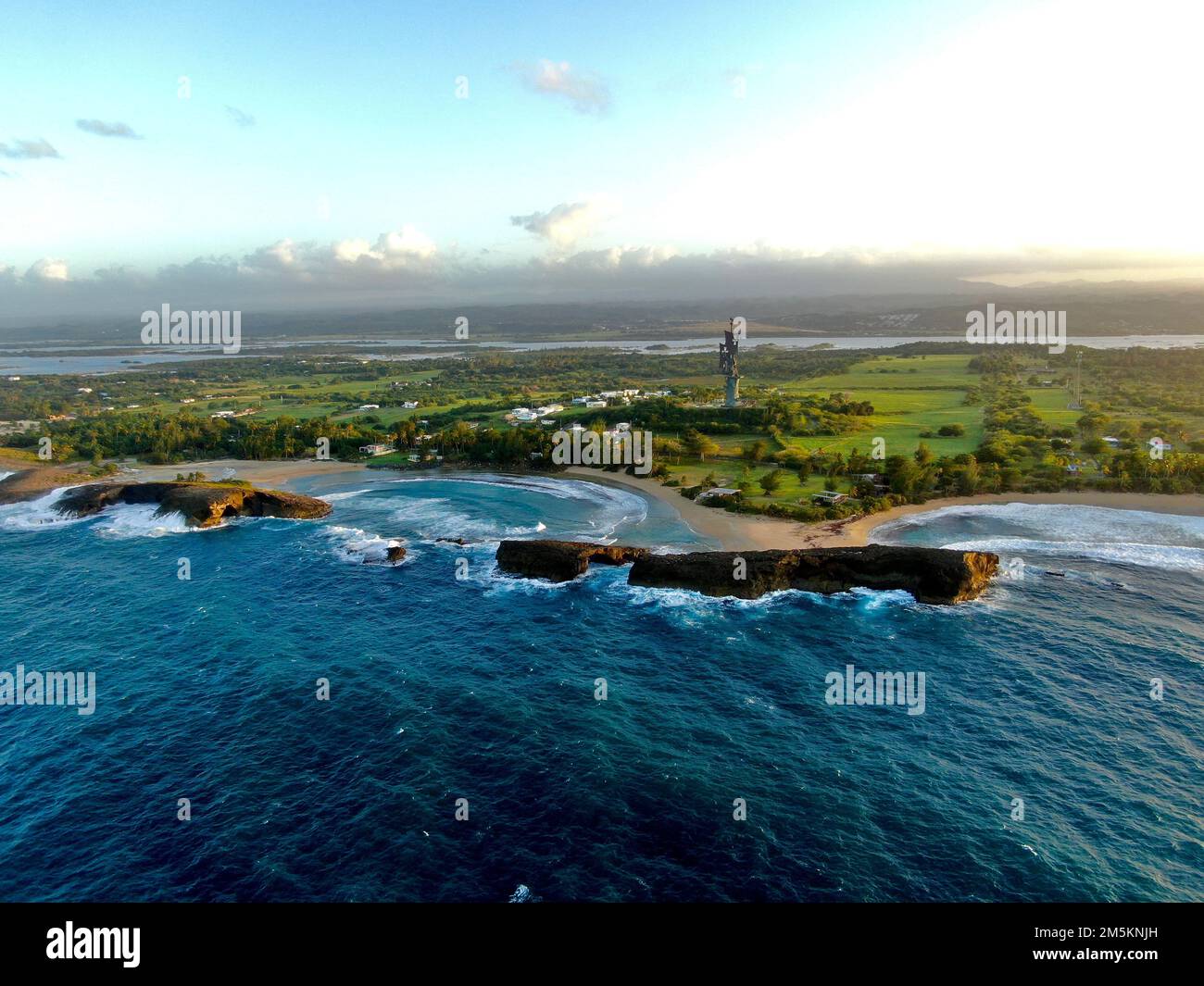 An aerial view of a beach with big rocks and waves Stock Photo - Alamy