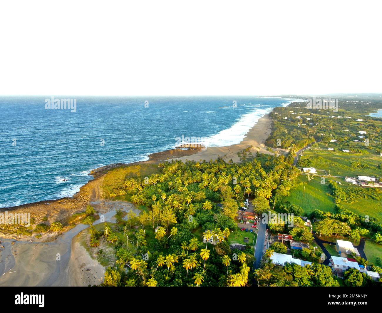 An aerial view of a beach with big rocks and waves Stock Photo - Alamy