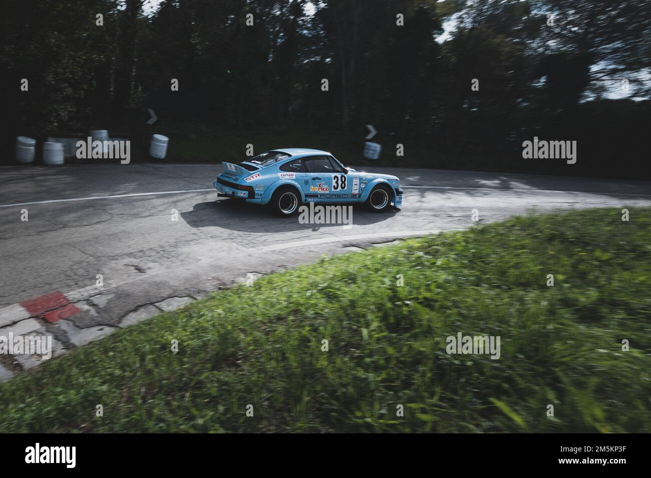 A blue car set up during an uphill speed race of the Italian ...