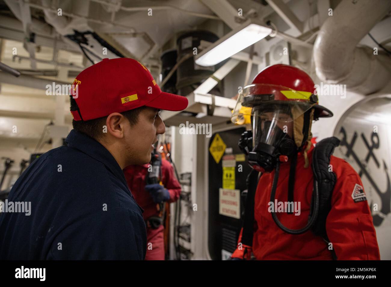 NORWEGIAN SEA (March 23, 2022) Yeoman 2nd Class Renato Tanamachi, left ...