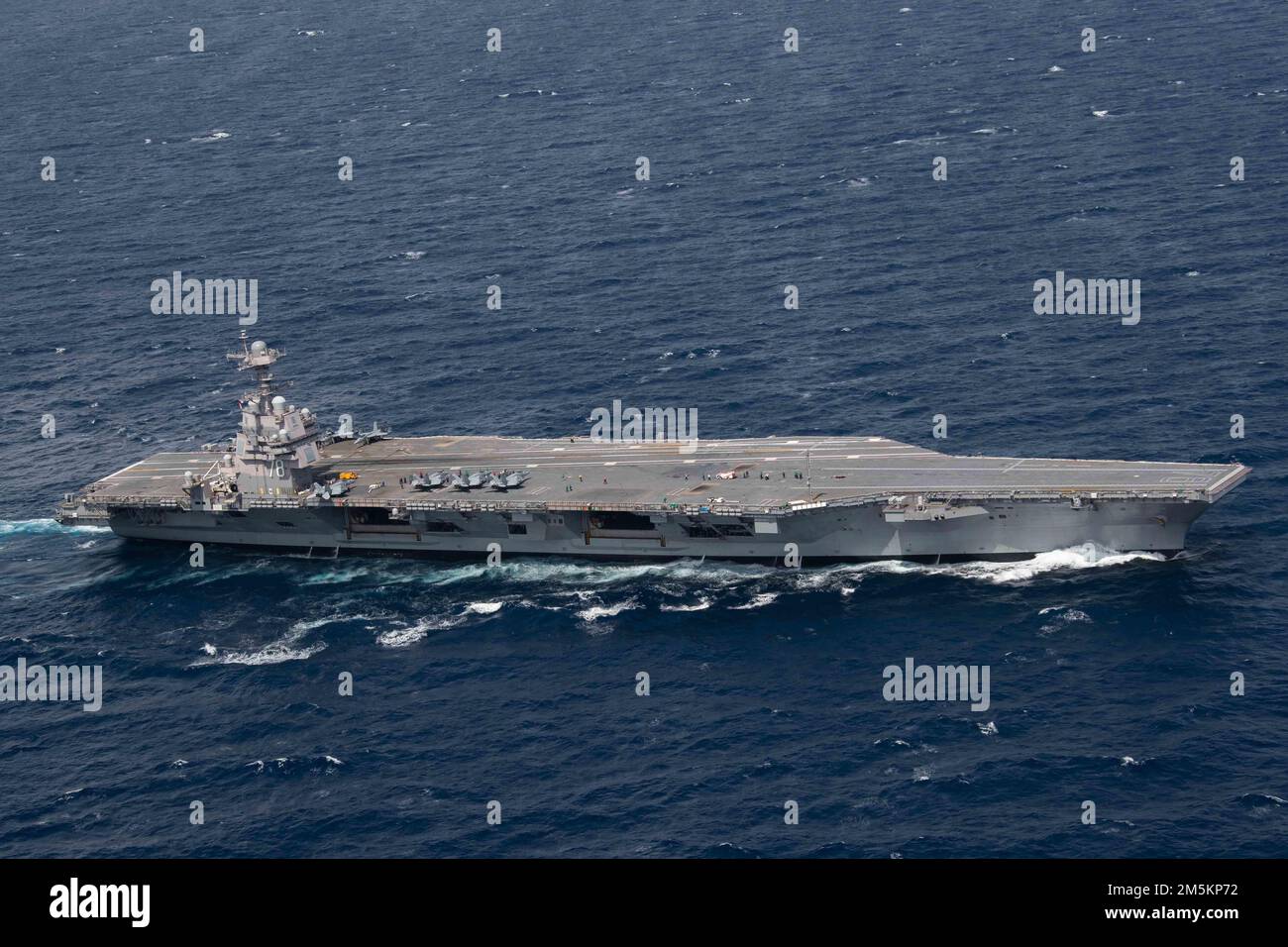 USS Gerald R. Ford (CVN 78) transits the Atlantic Ocean, March 23, 2022 ...