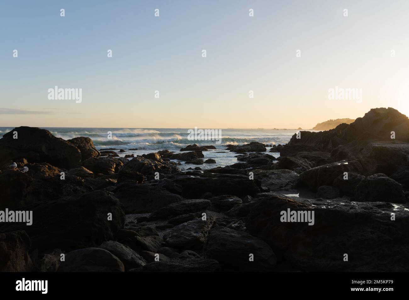 Mount Maunganui landscape at sunrise from base of mount, New Zealand ...