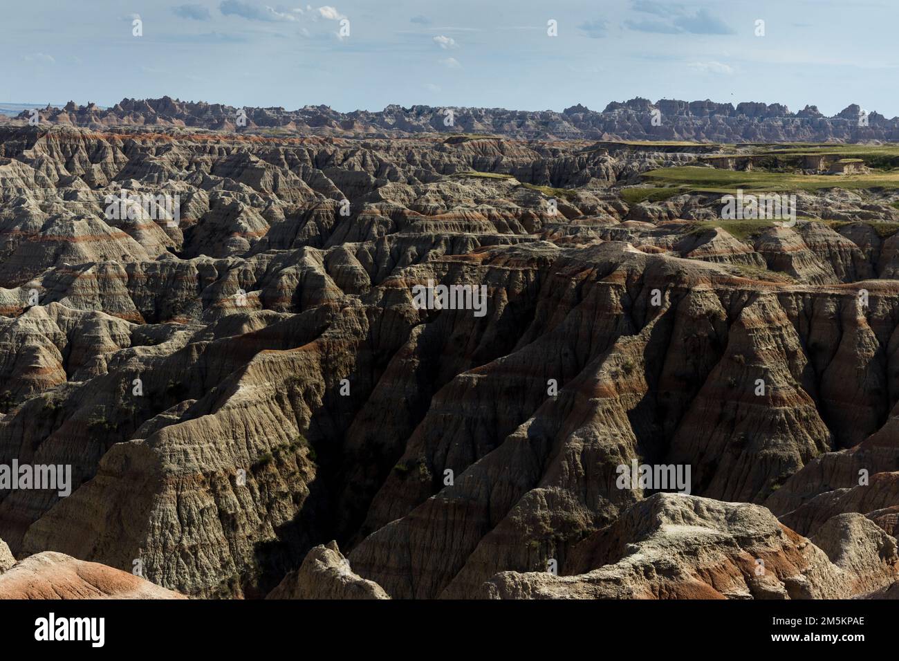 Dry Rocky Landscape of badlands National Park Along the Blue Sky Stock ...
