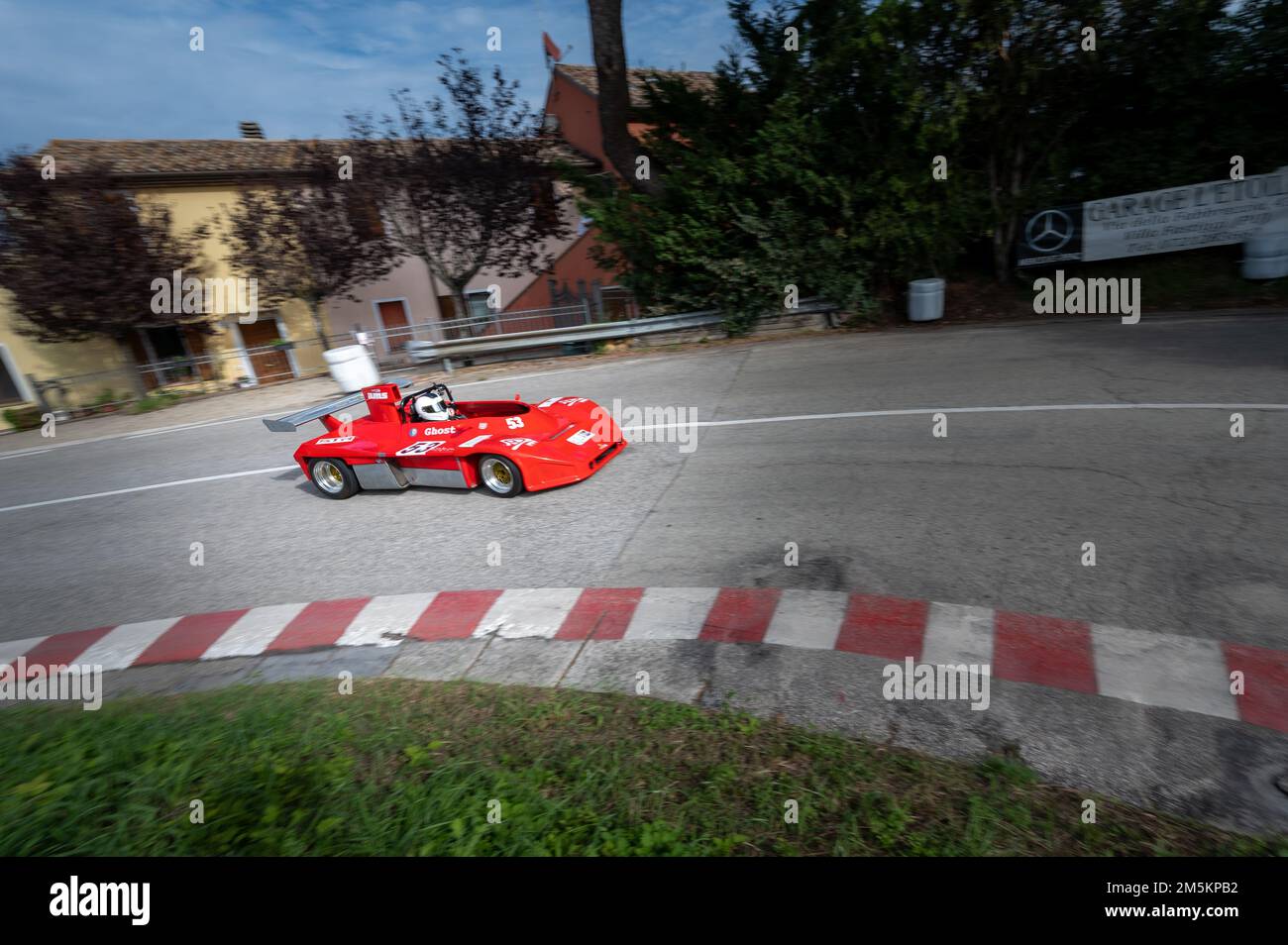 A red car set up during an uphill speed race of the Italian ...