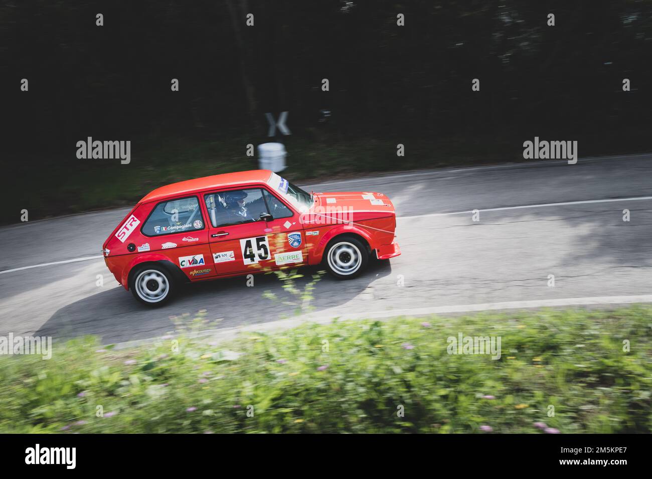 A red car set up during an uphill speed race of the Italian ...