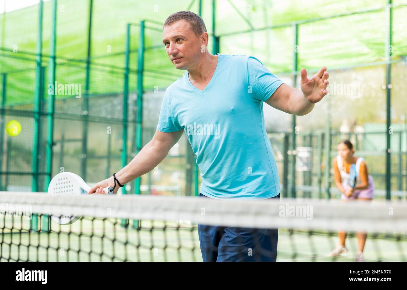 European man padel tennis player trains on the court Stock Photo - Alamy