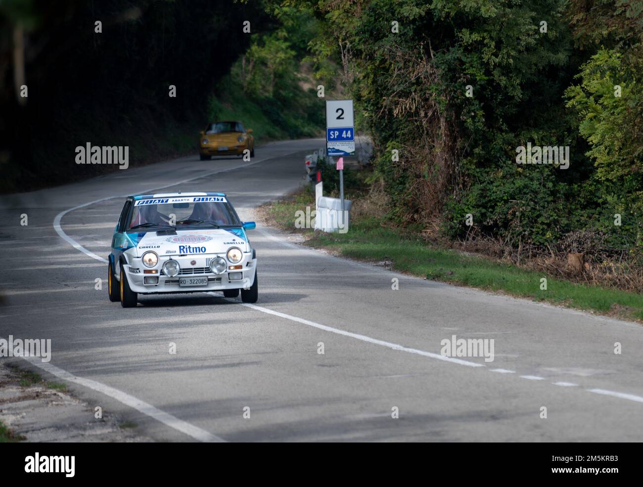 A blue and white car set up during an uphill speed race of the Italian ...
