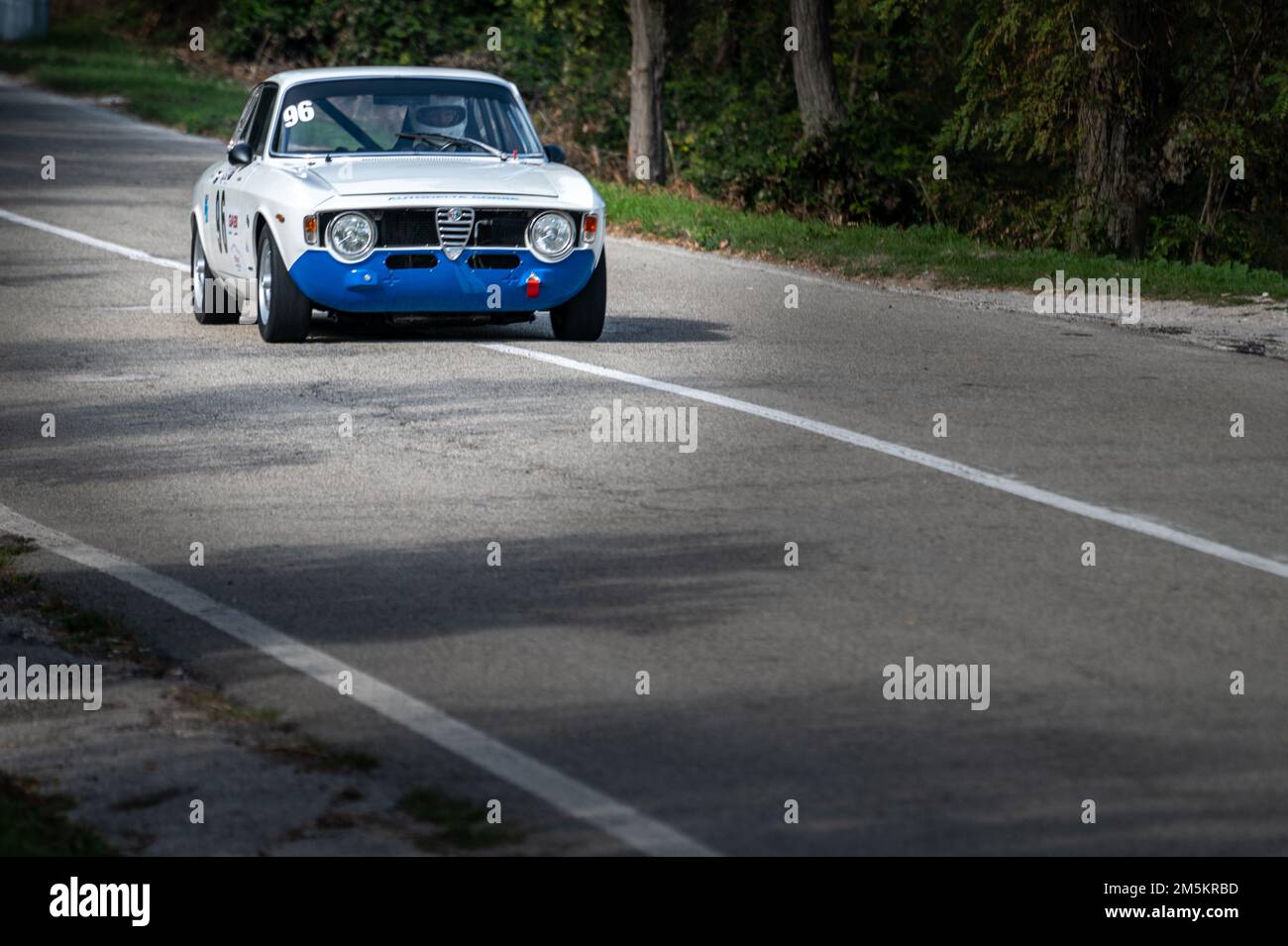 A blue and white car set up during an uphill speed race of the Italian ...