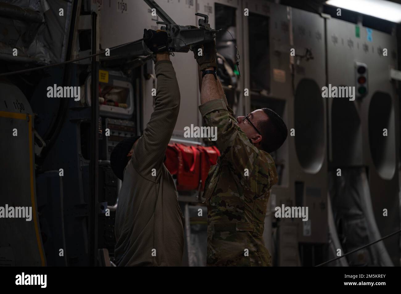 U.S. Air Force Senior Airman Tim McLaurin, left, and Tech. Sgt. Liam ...
