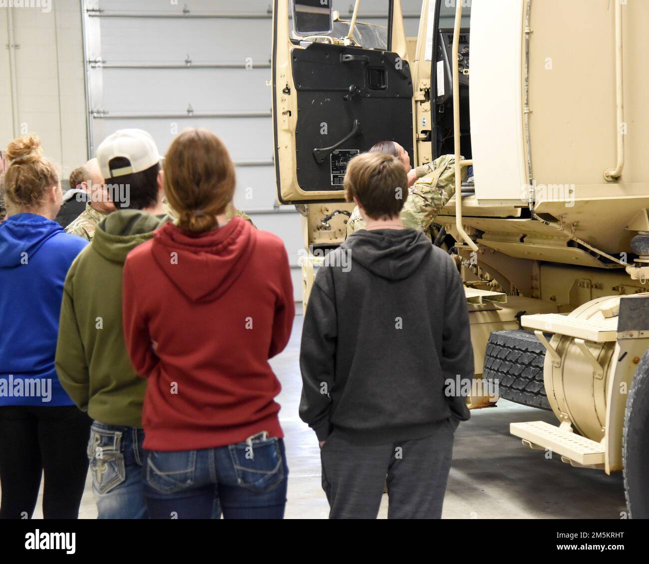 Michigan National Guard Soldiers display a military vehicle during a ...