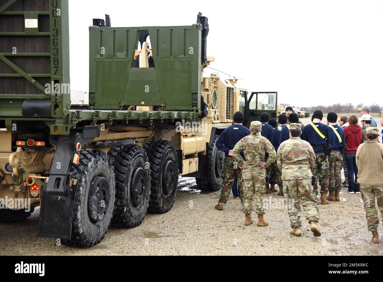Michigan National Guard Soldiers discuss a military vehicle during a ...