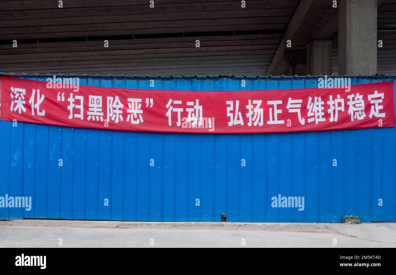 A red banner in the street for The Chinese Government Campaigns Against ...