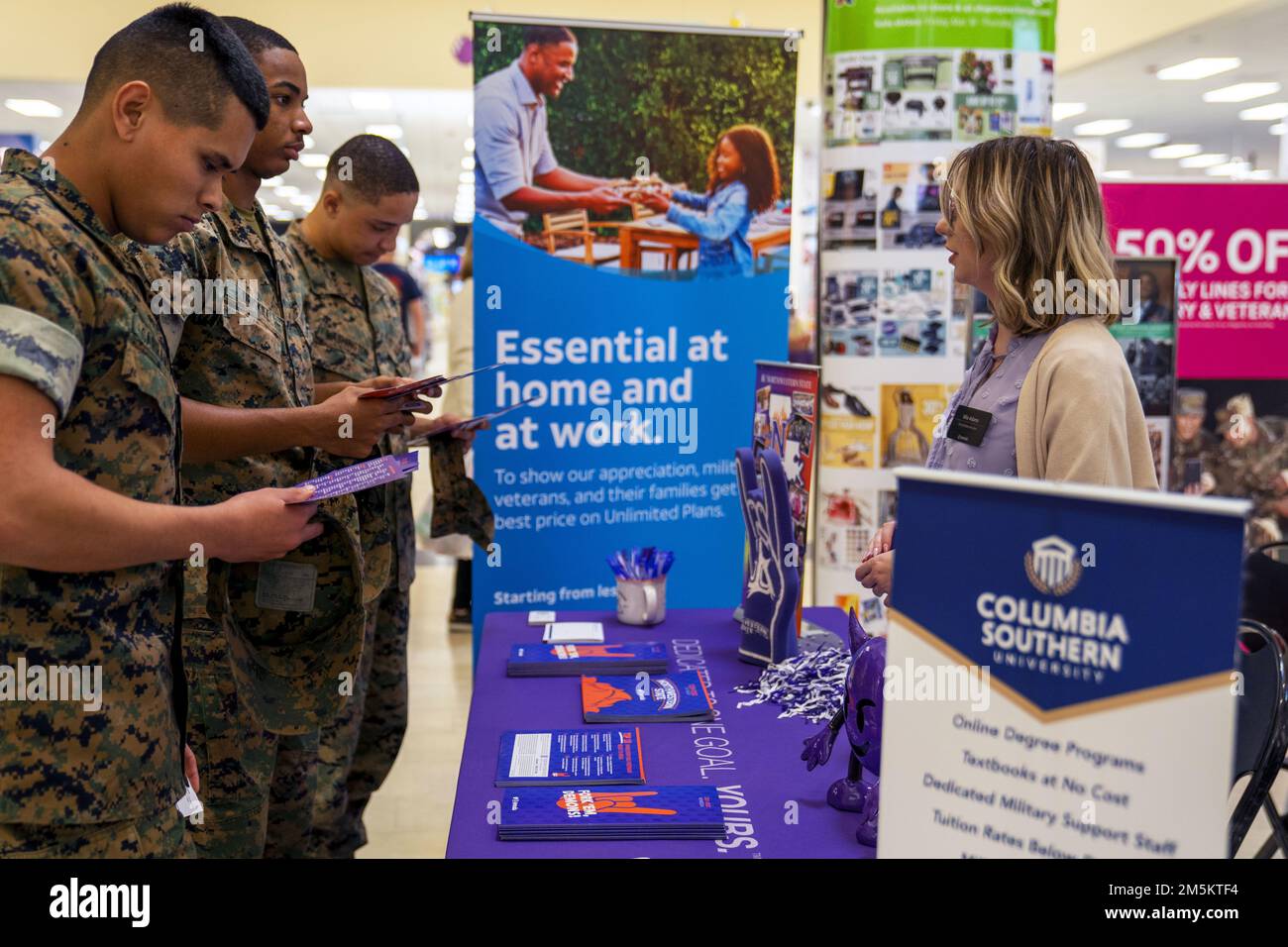 U.S. Marine Corps Marines tour booths at the Education Fair in the ...