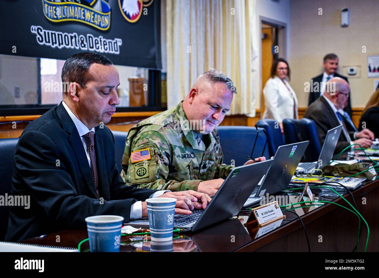 Staff assigned to the U.S. Army Reserve Command review presentations ...