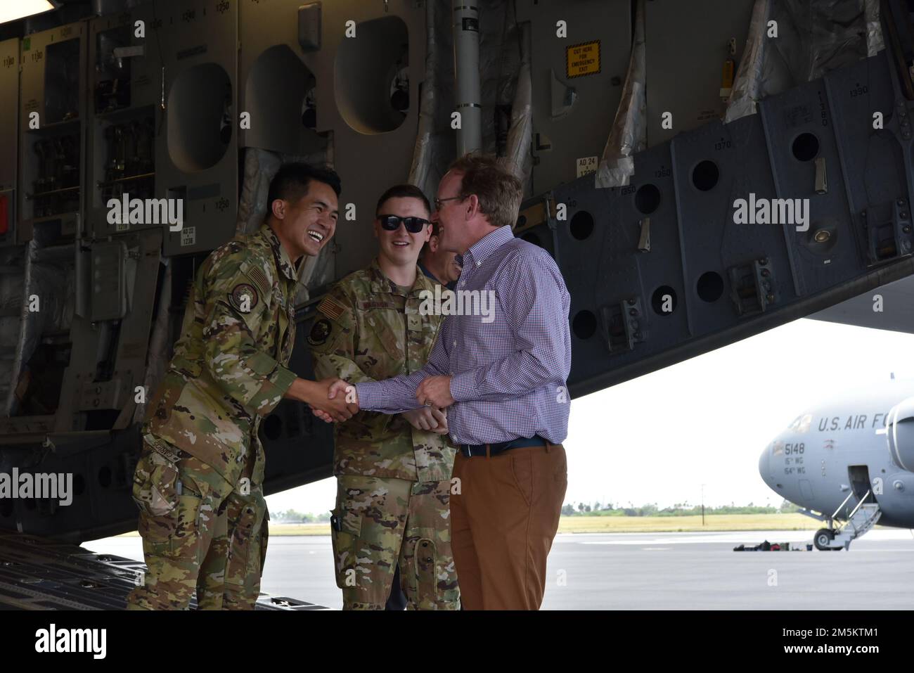 1st Lt. Ralph Andrew Carios, 535th Airlift Squadron pilot, receives a ...