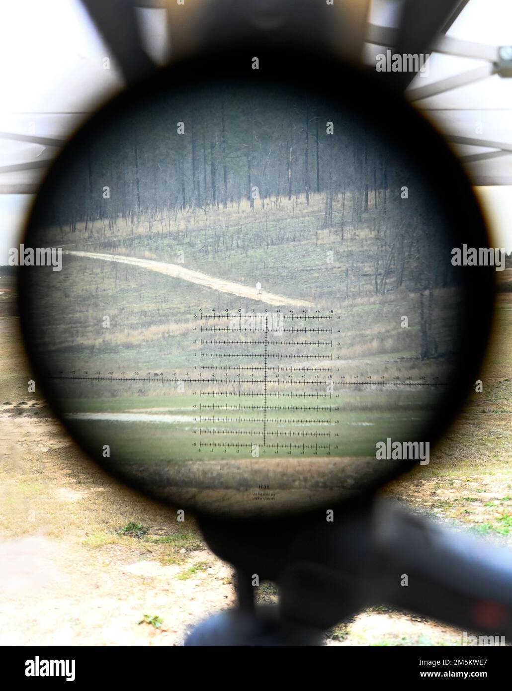 A target as seen through a spotting scope of an instructor from the ...
