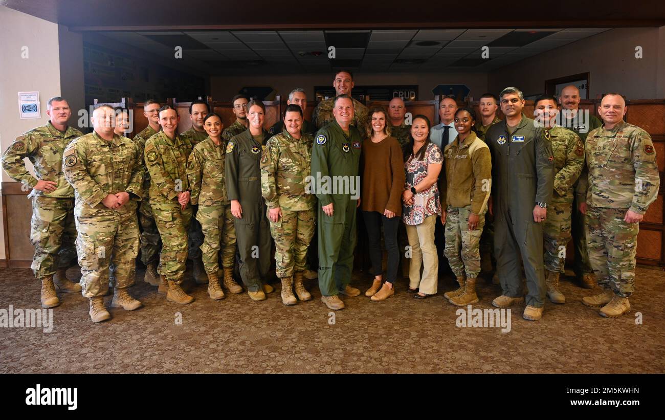 Holloman Airmen and spouses pose for a photo with Lt. Gen. Brad Webb ...