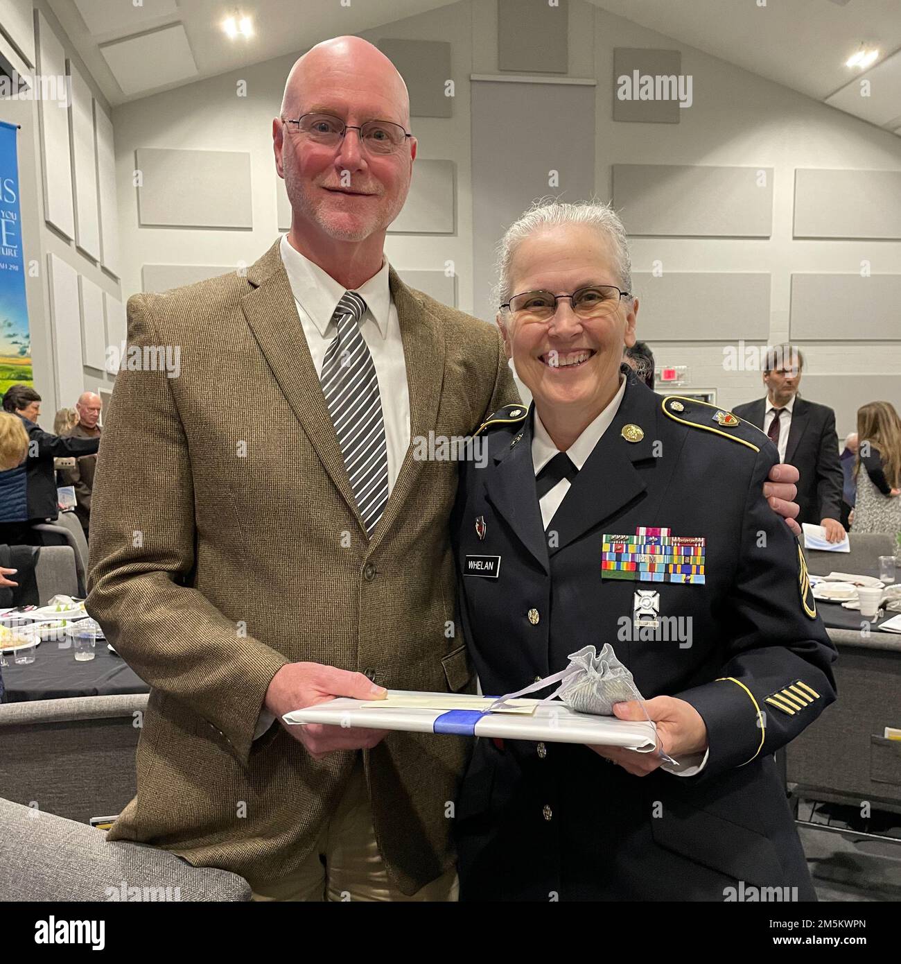 U.S. Army Staff Sgt. Andrea Whelan, right, poses for a photo with her husband, retired 1st Sgt ...