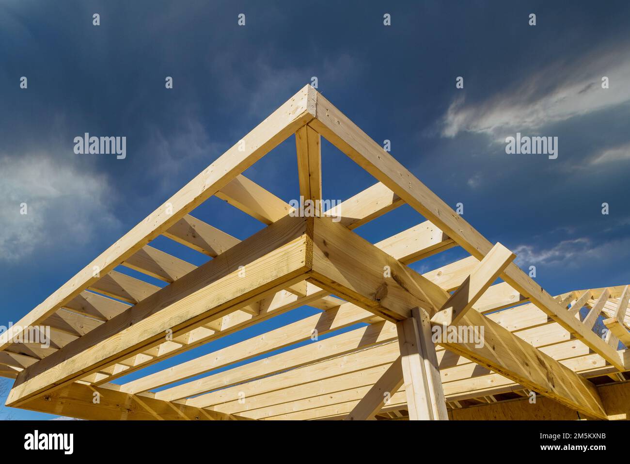 During construction of new stick home wooden roof beam was constructed ...