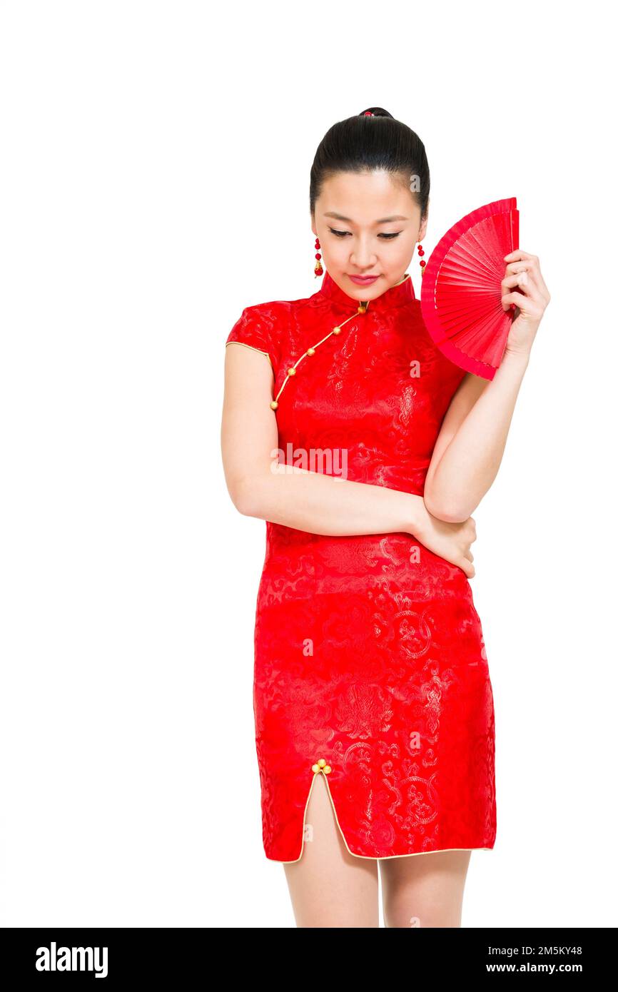 Casing wear red cheongsam young woman with the fan Stock Photo - Alamy