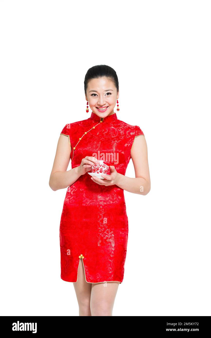 Take the young woman in red cheongsam Stock Photo - Alamy