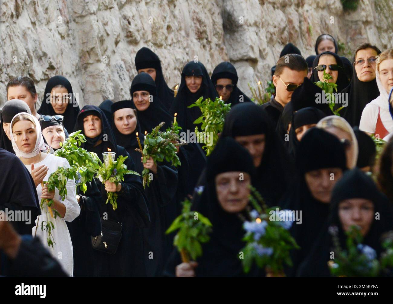 Orthodox Christian nuns walking in a procession from Tomb of the Virgin ...