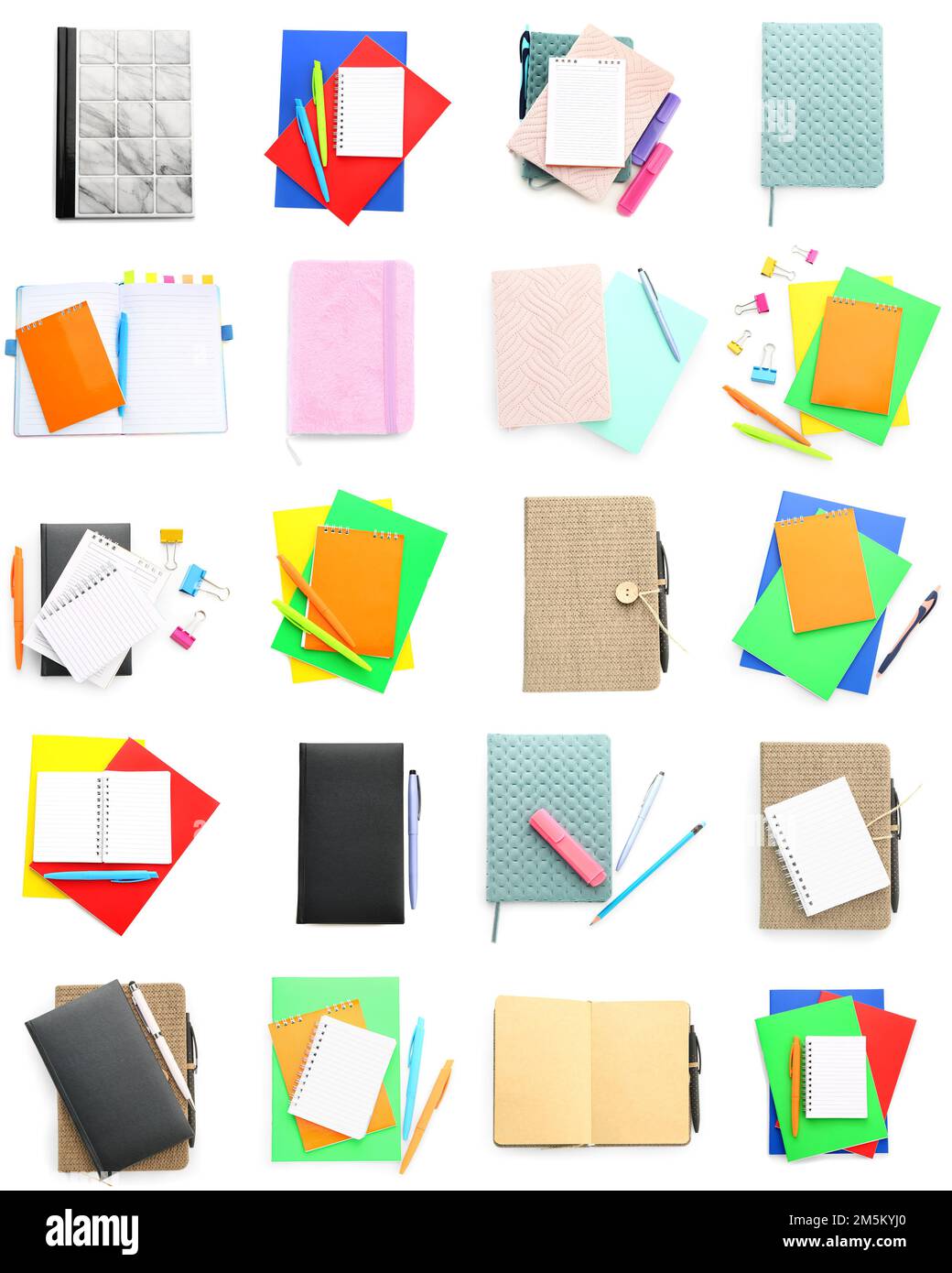 Collection of stylish notebooks with stationery on white background ...
