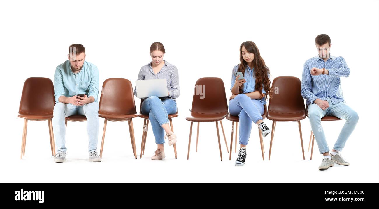 Young people waiting in line on white background Stock Photo - Alamy