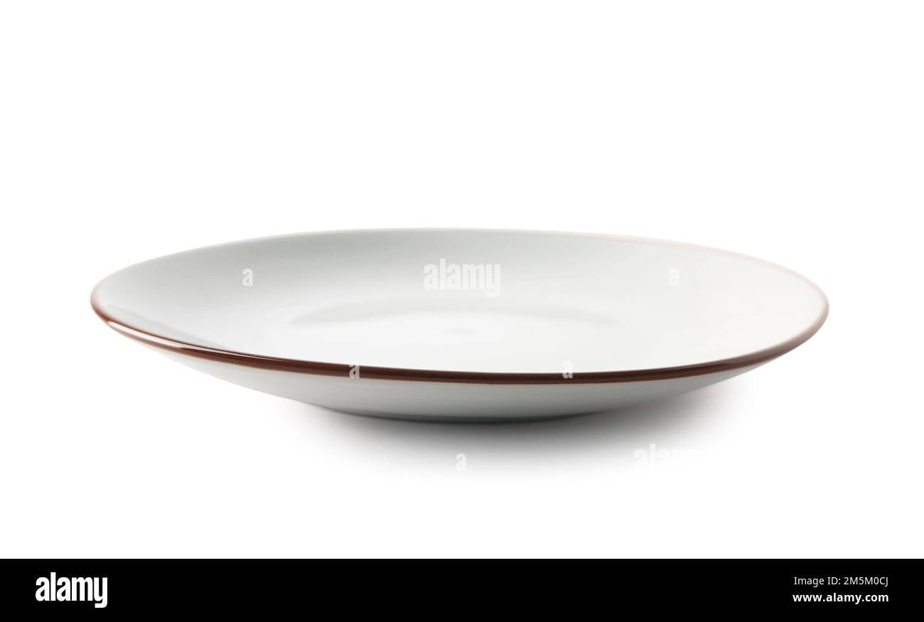 Round ceramic plate isolated on white background Stock Photo - Alamy