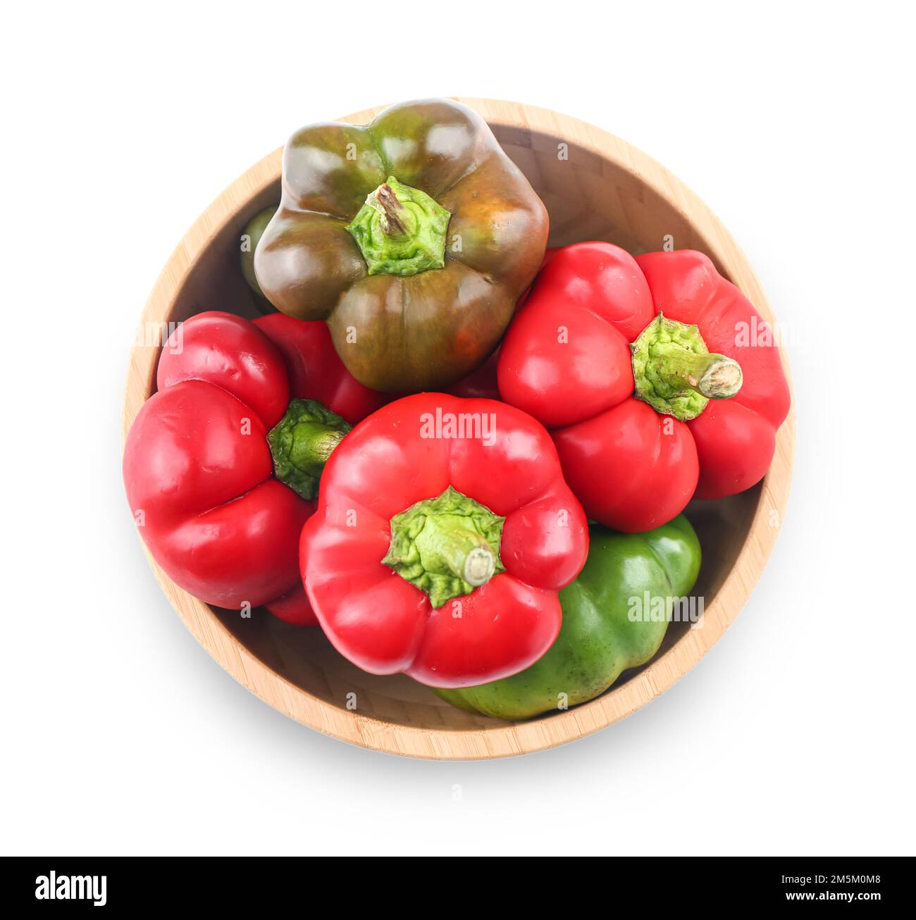 Wooden bowl of fresh bell peppers on white background Stock Photo - Alamy
