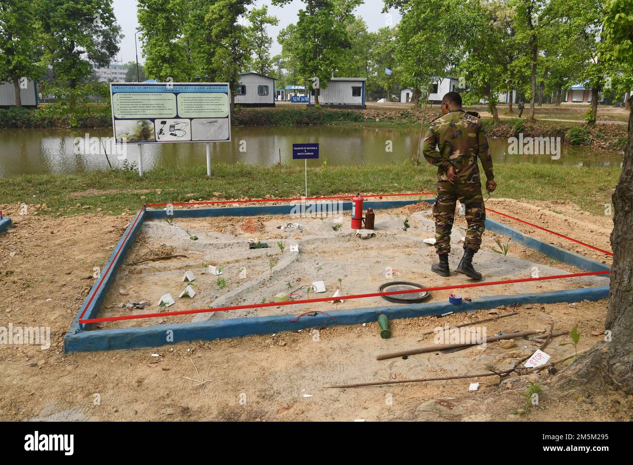 Bangladeshi soldiers construct scenario models in the cordoned off ...
