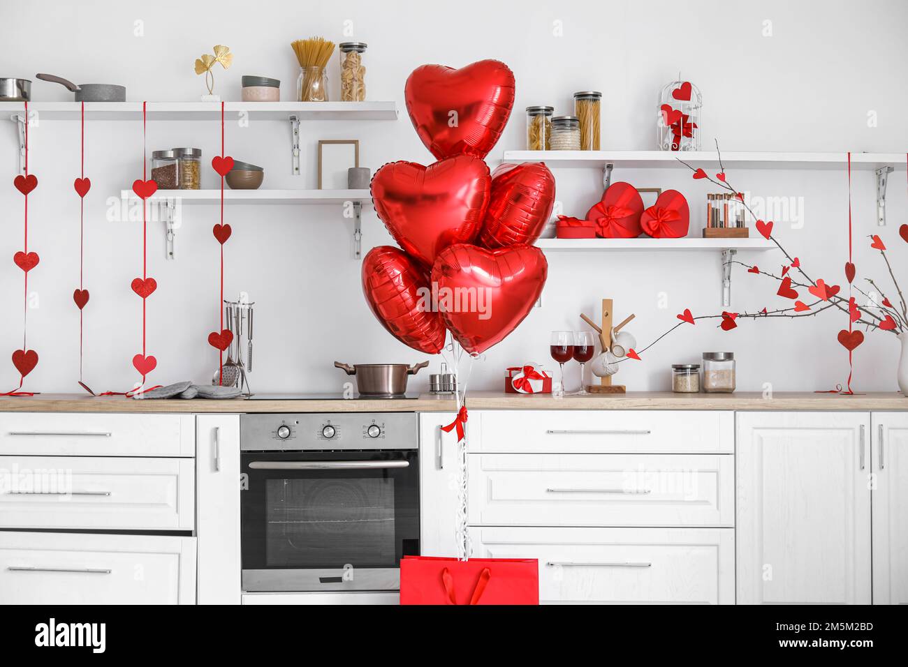 Interior of kitchen decorated for Valentine's Day with balloons ...