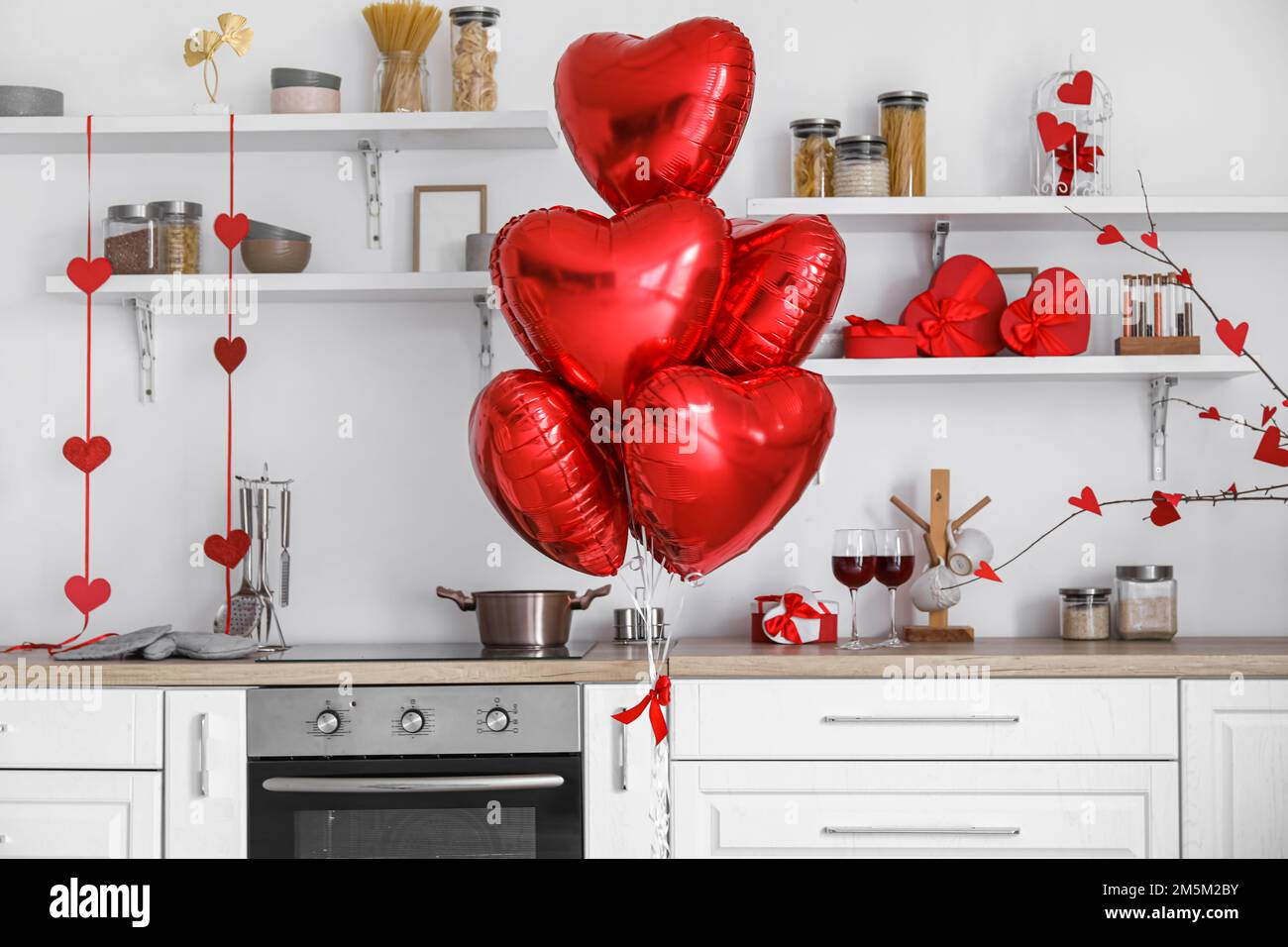 Interior of kitchen decorated for Valentine's Day with balloons ...