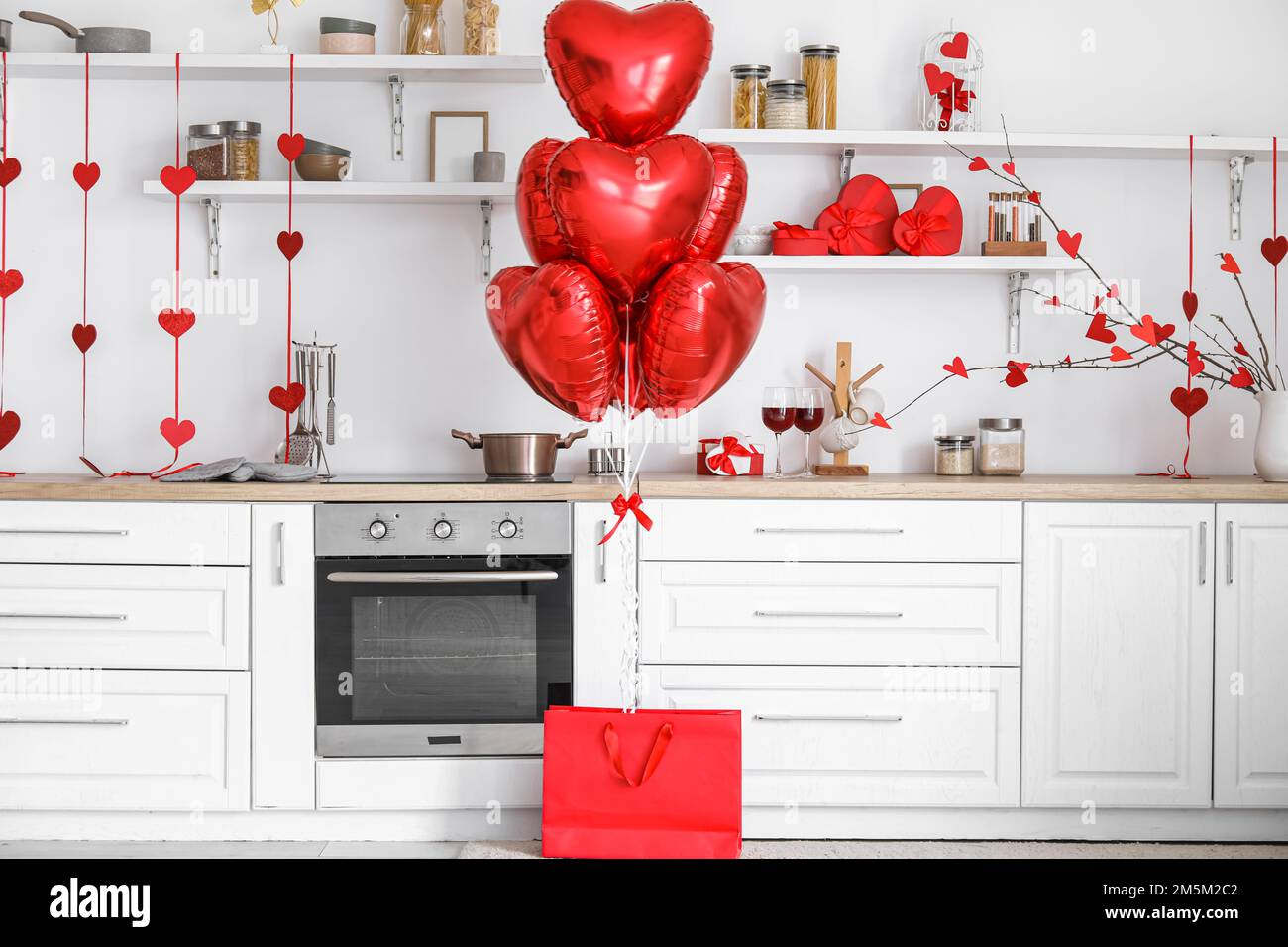 Interior of kitchen decorated for Valentine's Day with balloons ...