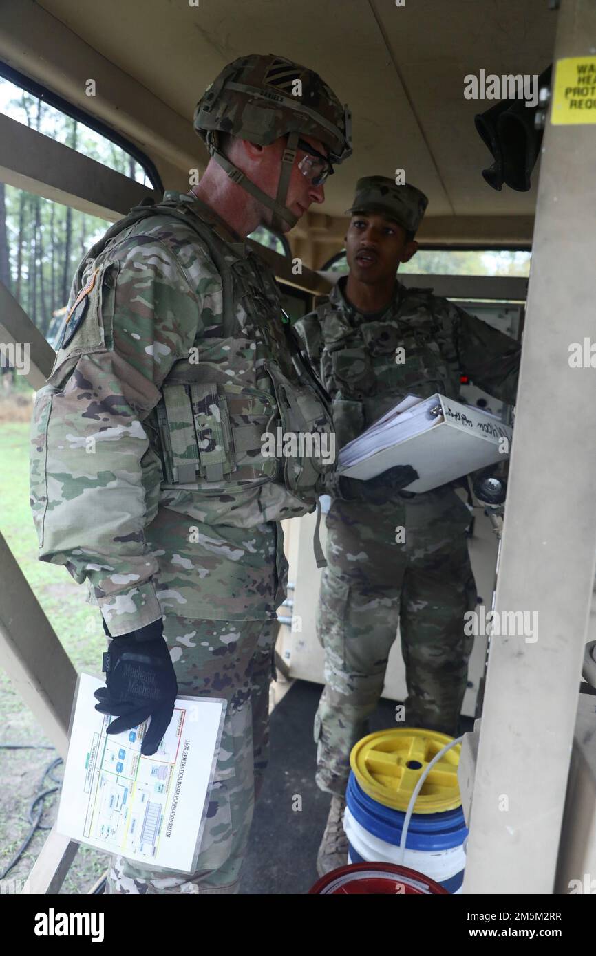 Spc. Merlin Padilla, a water treatment specialist assigned to Alpha ...