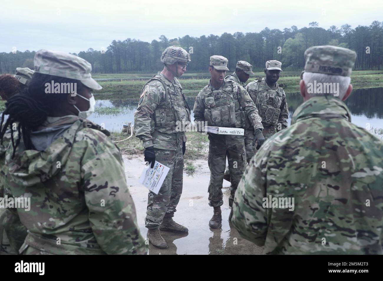Spc. Merlin Padilla, a water treatment specialist assigned to Alpha ...