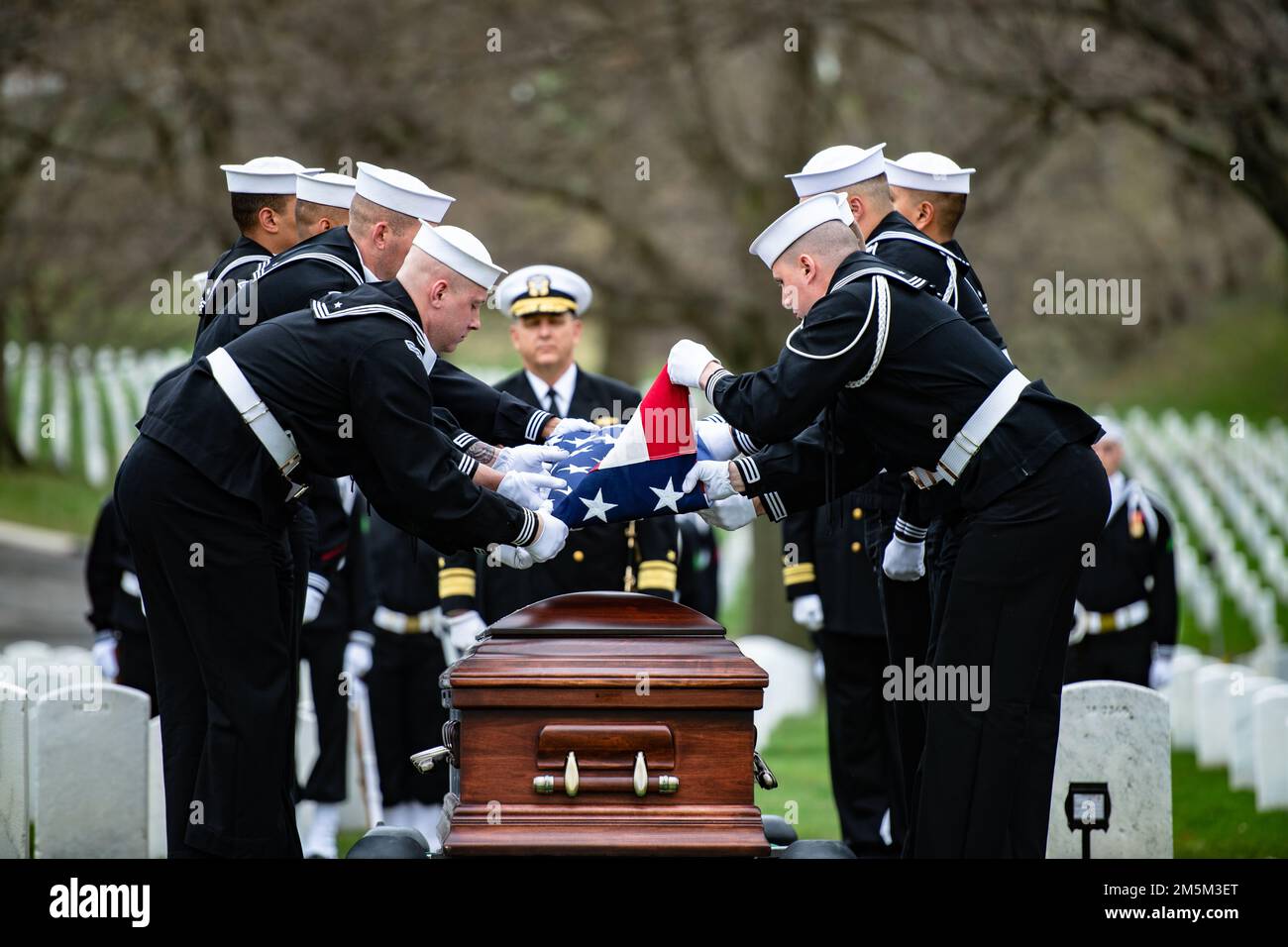 Sailors from the U.S. Navy Ceremonial Guard fold the U.S. flag during ...
