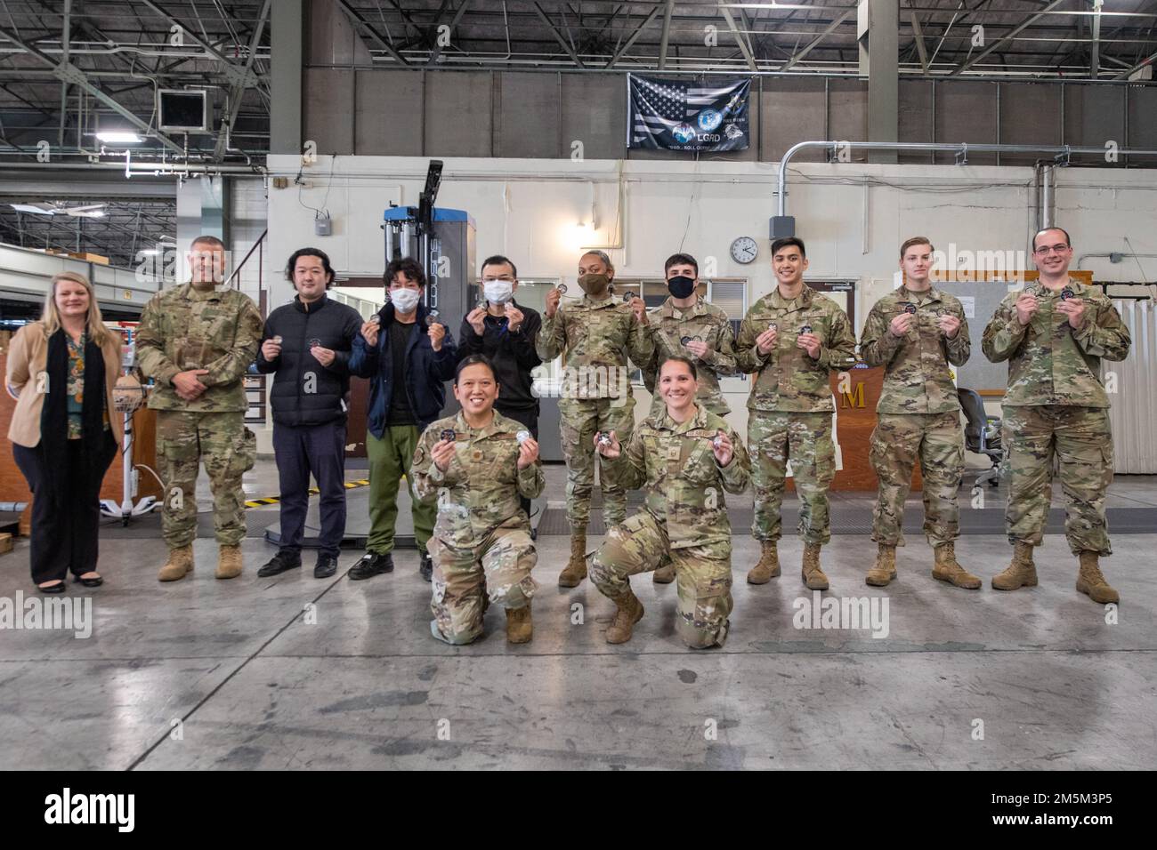 Members from the 374th Logistic Readiness Squadron pose for a photo ...