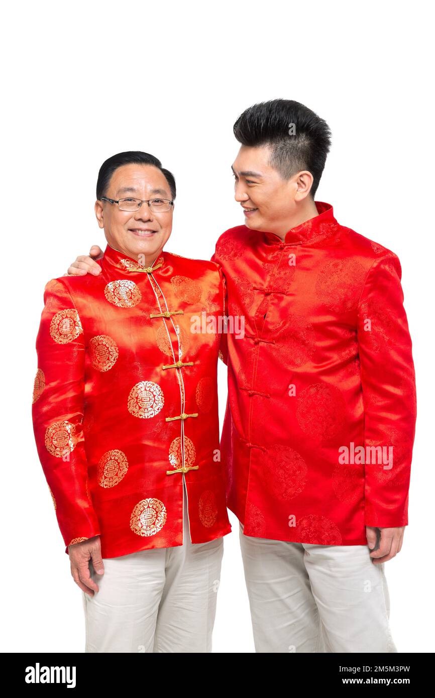 Take the Chinese New Year tang suit man and father Stock Photo - Alamy