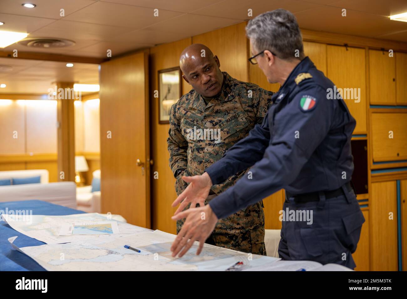 U.S. Marine Corps Brig. Gen. Anthony Henderson, left, discusses ...