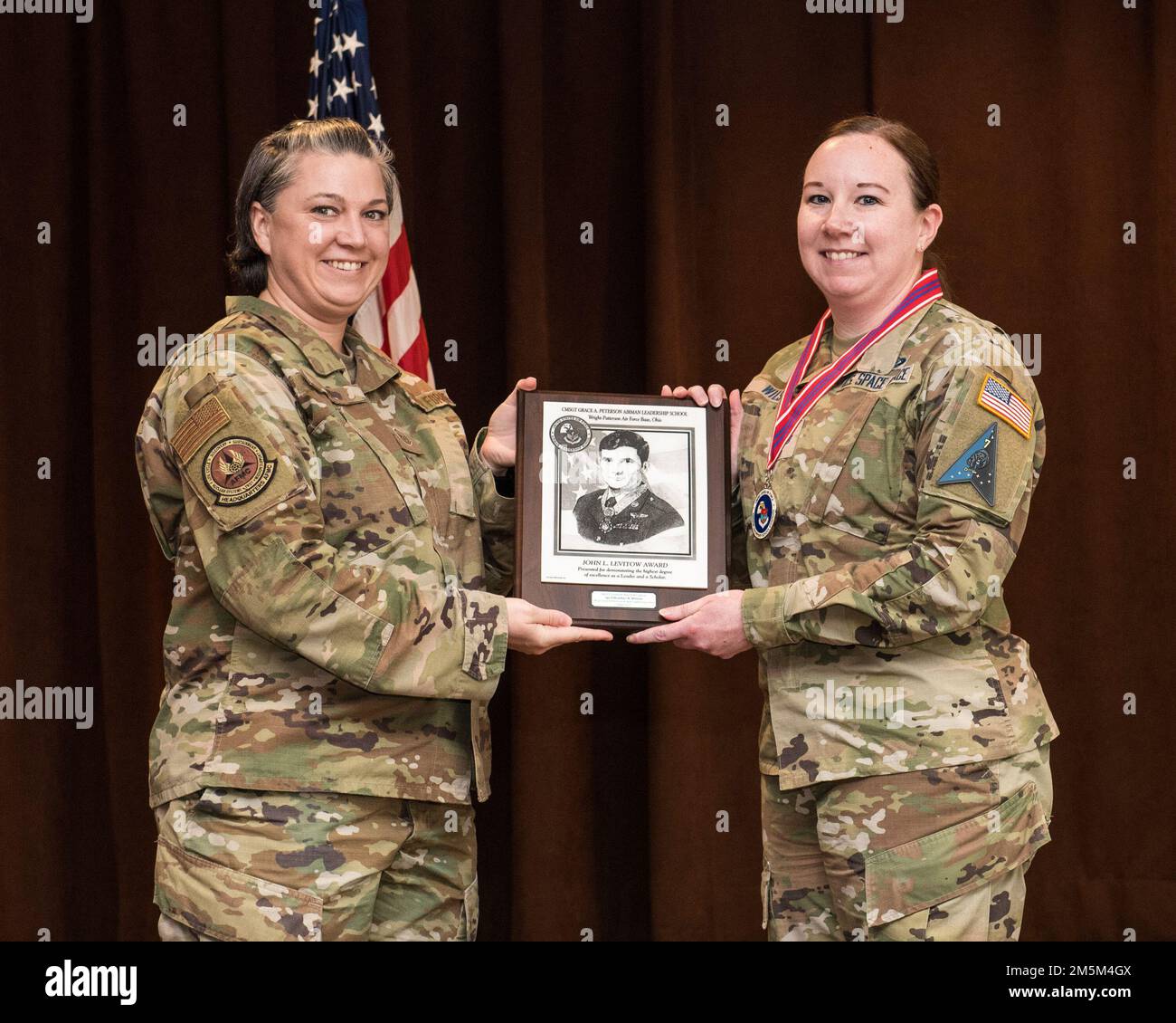 Master Sgt. Dominique Hix presents U.S. Space Force Specialist 4 ...
