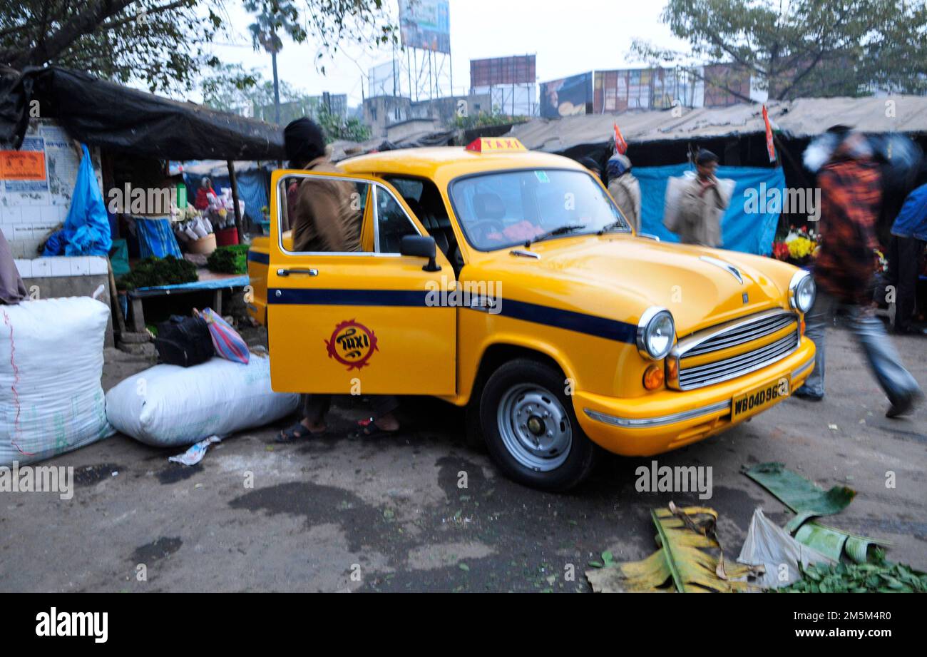 Iconic yellow indian taxi hi-res stock photography and images - Alamy