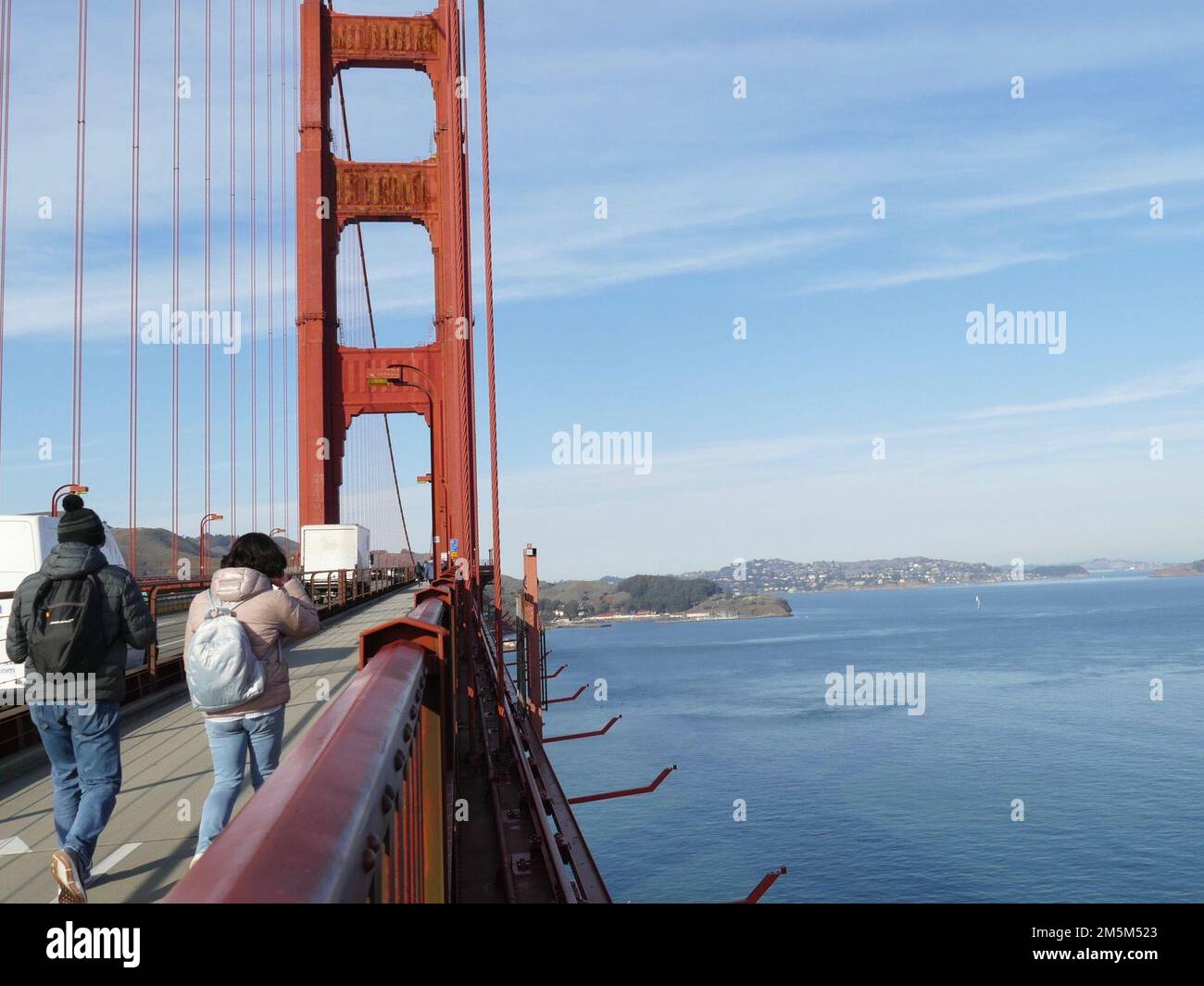 San Francisco, USA. 14th Dec, 2022. Passers-by walk along the Golden ...