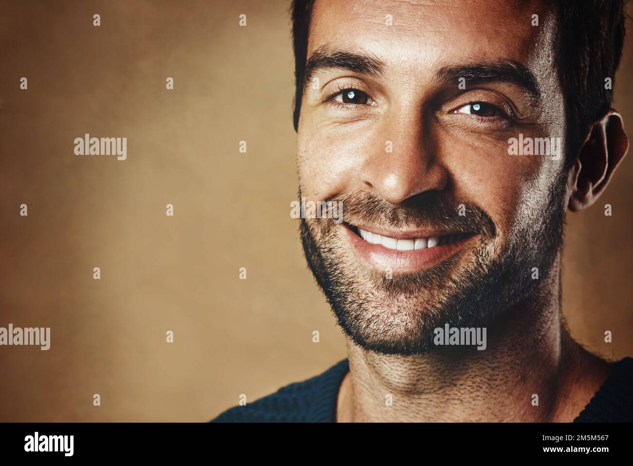 Up close and personal with Mr Handsome. Studio portrait of a handsome ...