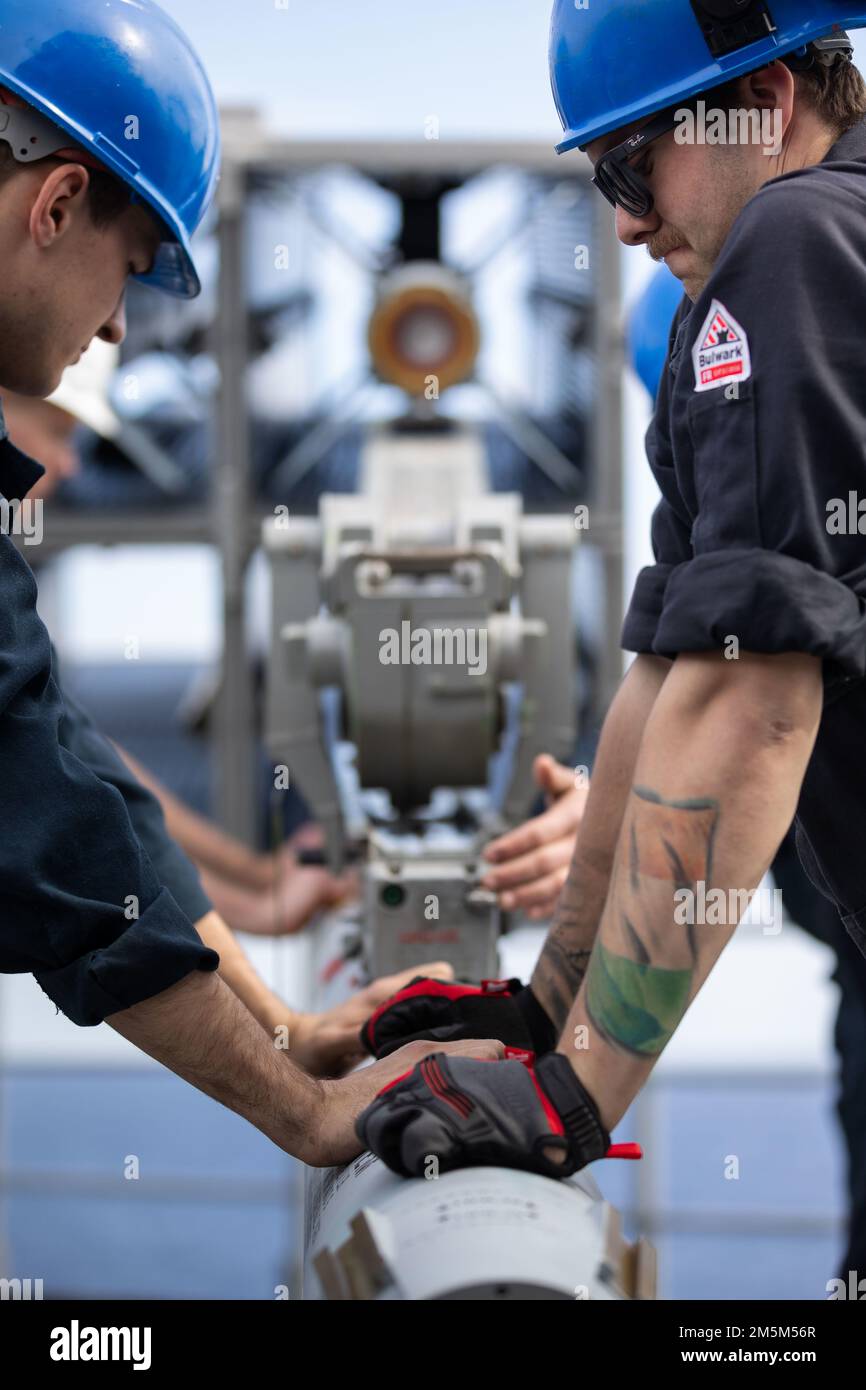 ATLANTIC OCEAN - Fire Controlman 3rd Class Christopher Williams, right ...