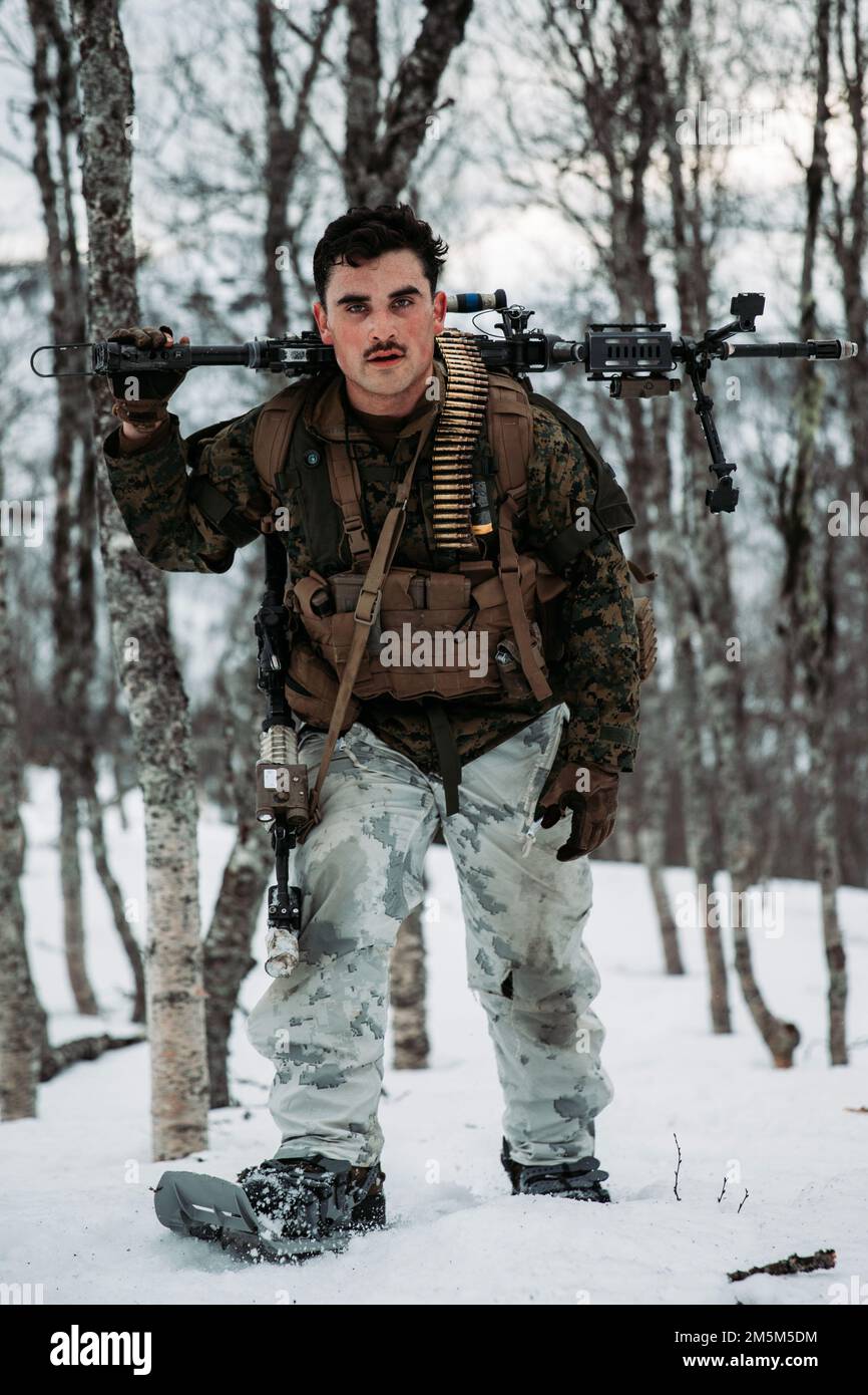 U.S. Marine Corps Lance Cpl. Jacob McCurry moves to an objective during ...