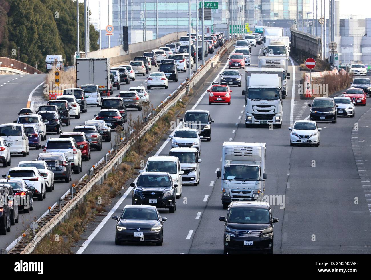 Tokyo, Japan. 30th Dec, 2022. Motorists are caught in a traffic jam ...