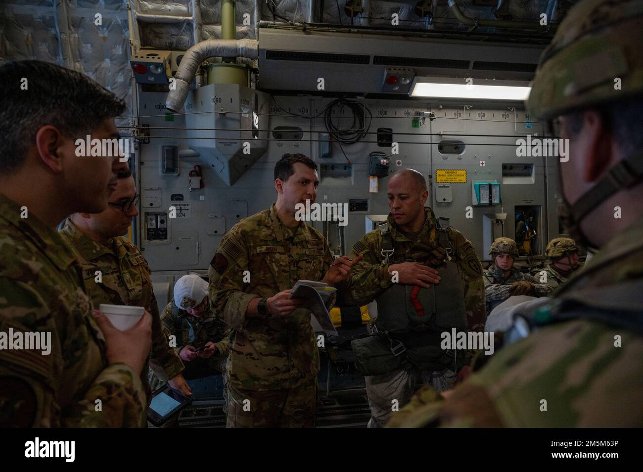 U.S. Air Force Capt. Chris Rolon, center, a pilot with the 8th Airlift ...
