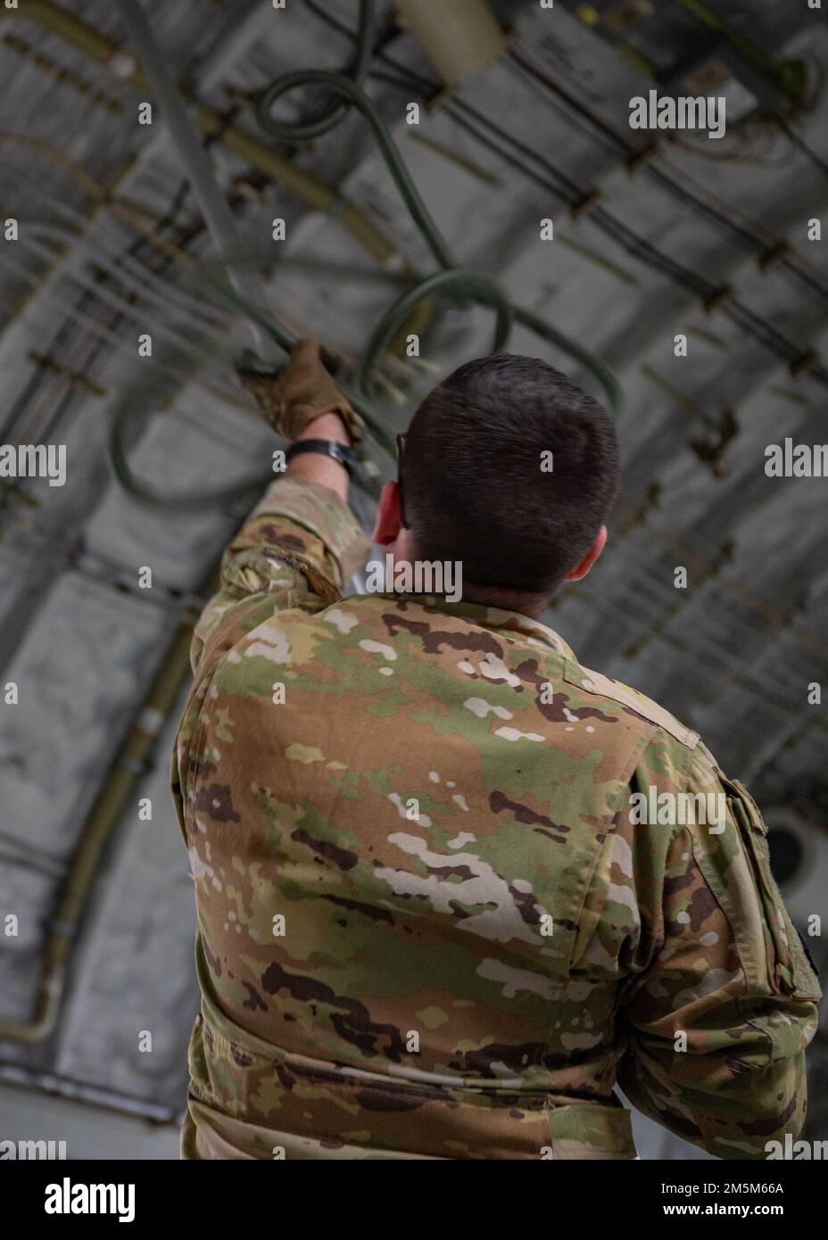 U.S. Air Force Tech. Sgt. Liam Vining, a loadmaster assigned to the 8th ...