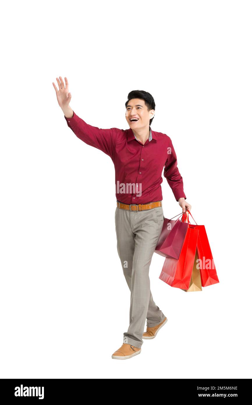 Shed on young man carrying a shopping bag Stock Photo - Alamy Shed on young man carrying a shopping bag Stock Photo - Alamy